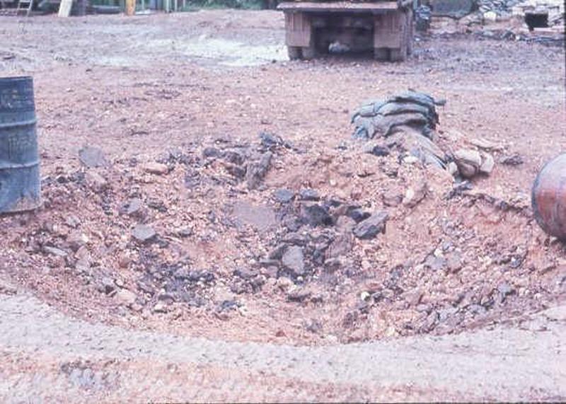 Photo: DAK TO, 1969. Large hole made by a 122mm Rocket in our Motor ...