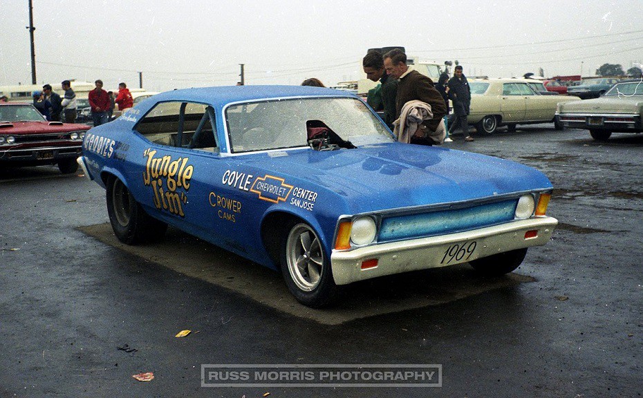 Photo: Jungle Jim Liberman's '69 Nova in the pits on a rainy day at ...